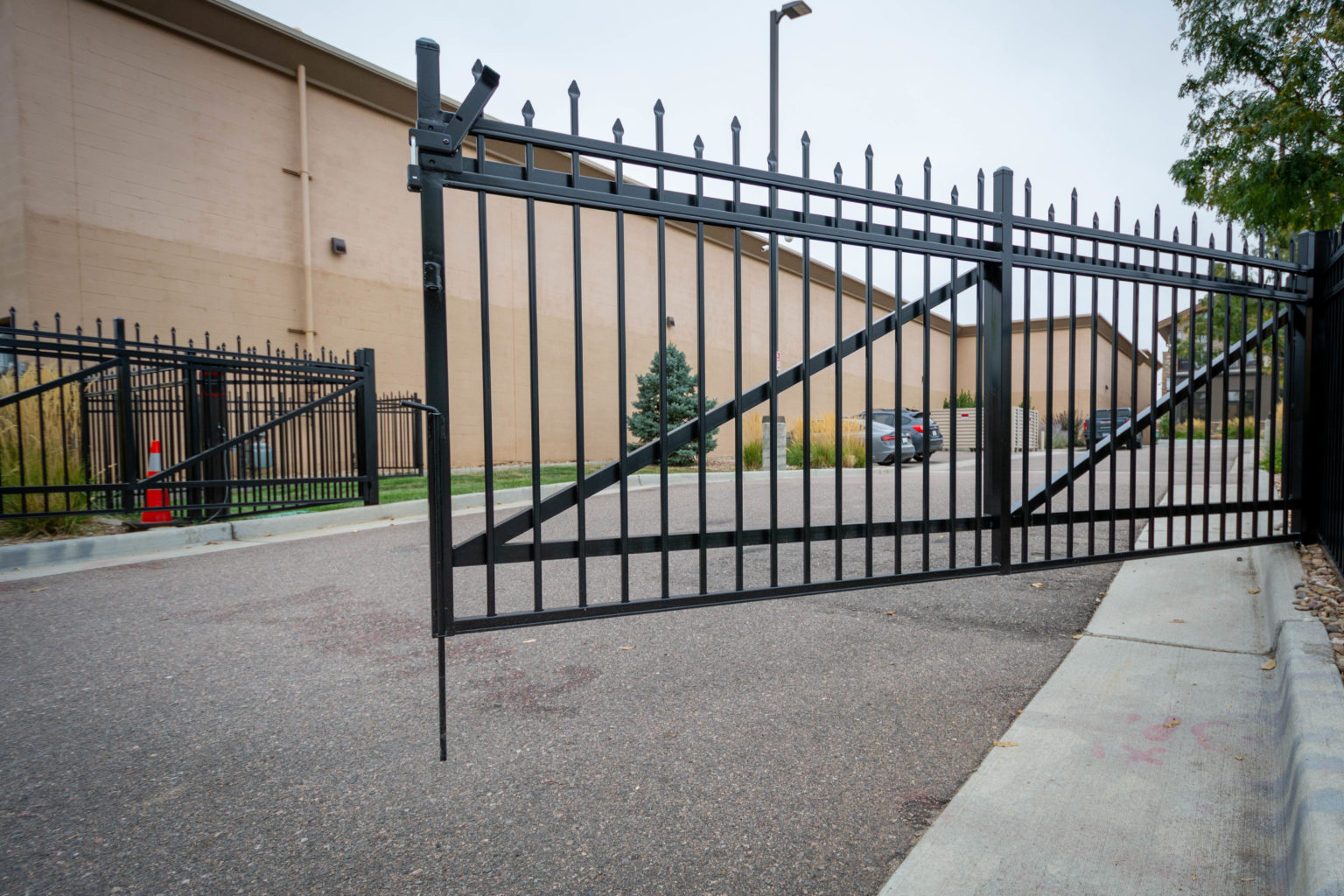 Cantilever Gates vs. Swing Gates: Commercial Fencing